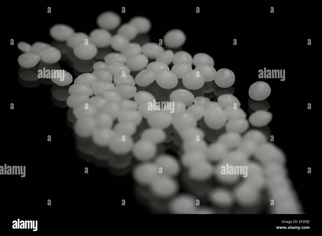 Grains or granules of polymorphic plastic. Unusual types of plastic ...