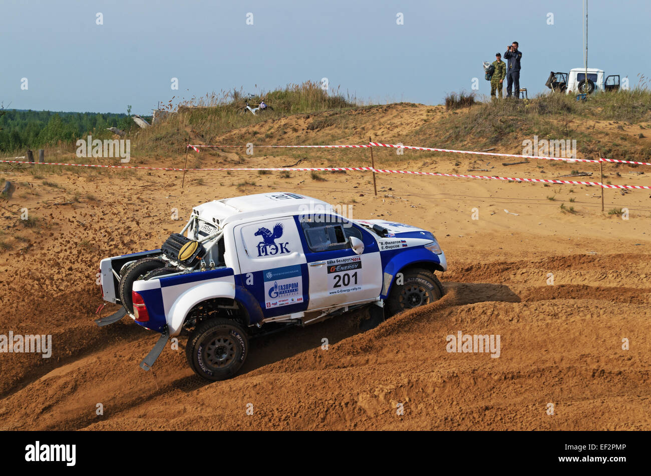 Races on a rally-raid on sandy dunes. Rally-raid Baha "Belarus" 2014 ...