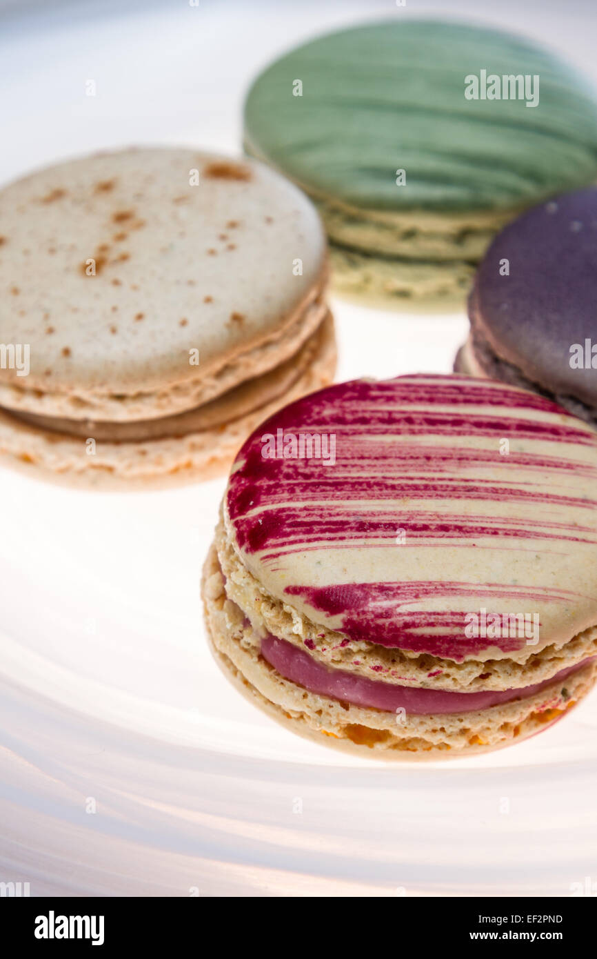 classic hand made fresh macaroons on a glowing plate Stock Photo - Alamy