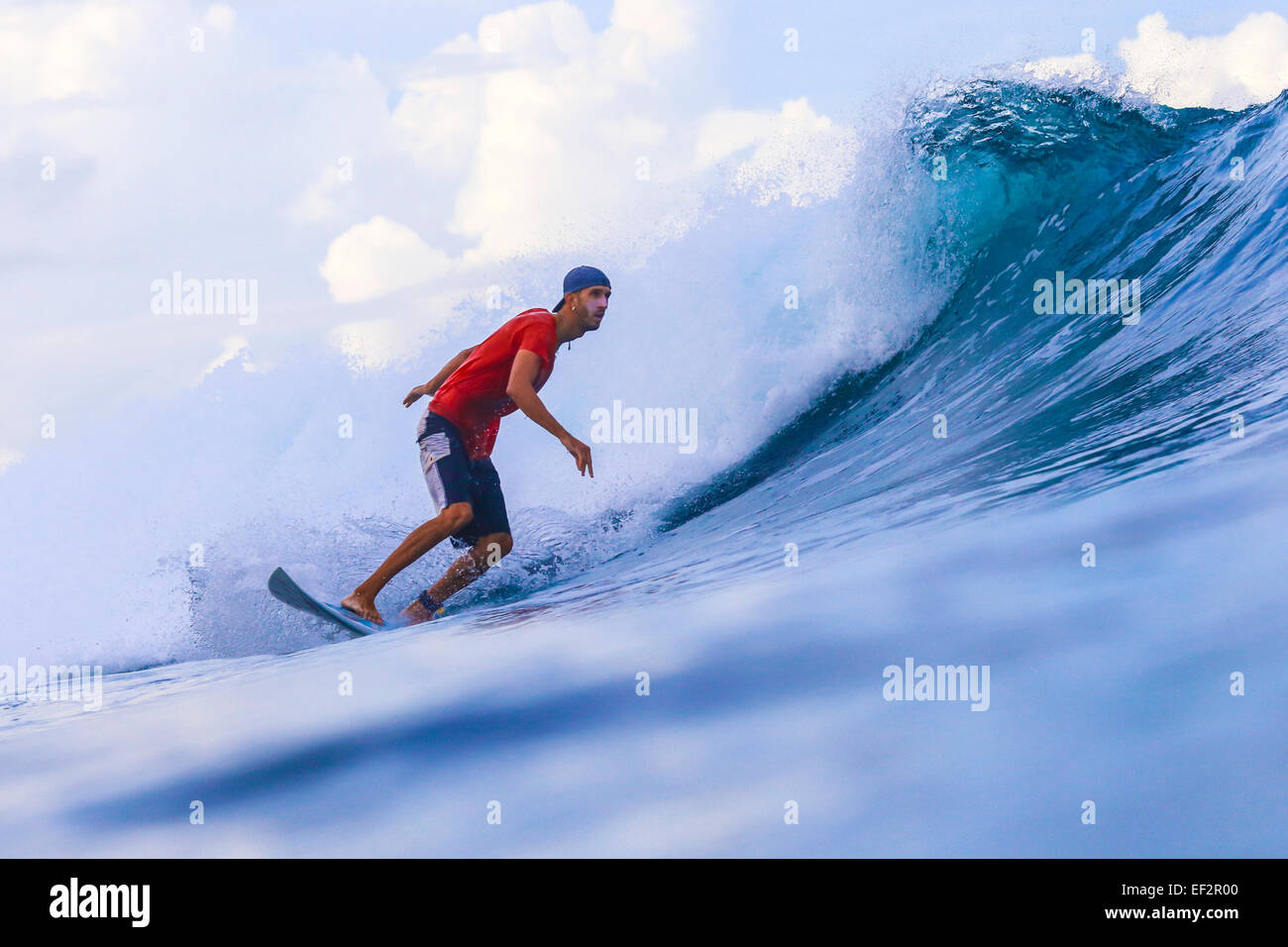 Surfer on Amazing Blue Wave, Bali island Stock Photo - Alamy