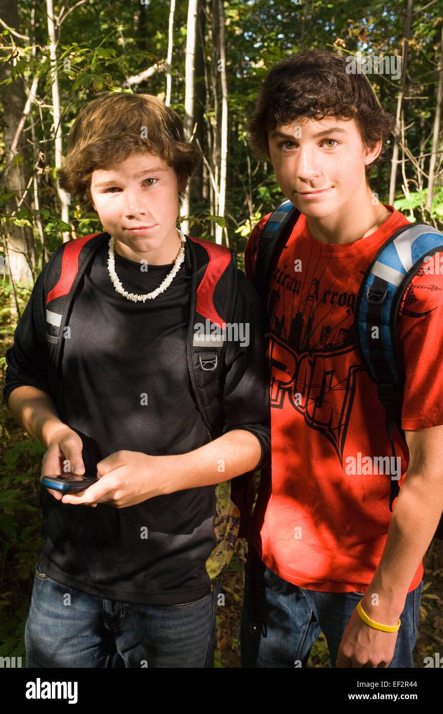 Two young boys wearing backpacks Stock Photo - Alamy