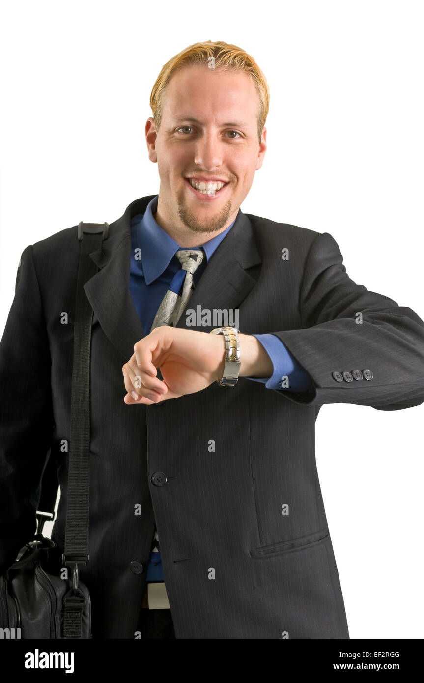 Businessman checking his watch Stock Photo - Alamy