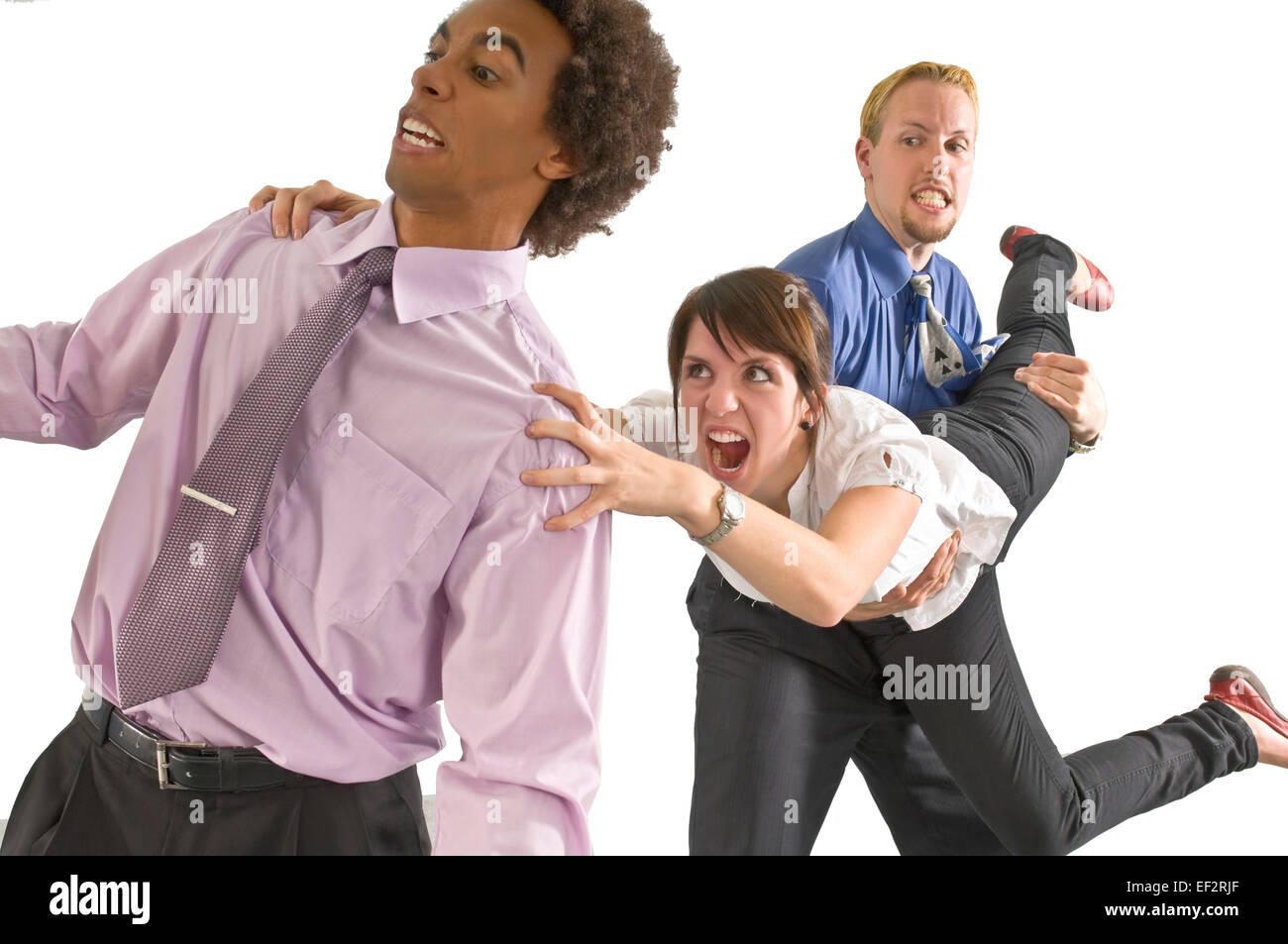 Man trying to stop woman from attacking another man Stock Photo - Alamy