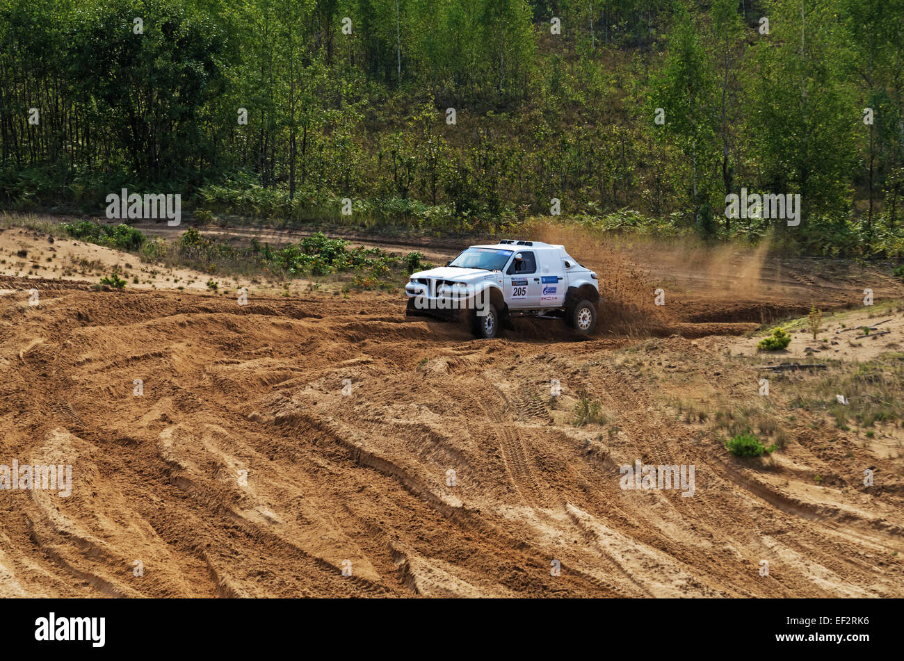 Races on a rally-raid on sandy dunes. Rally-raid Baha "Belarus" 2014 ...