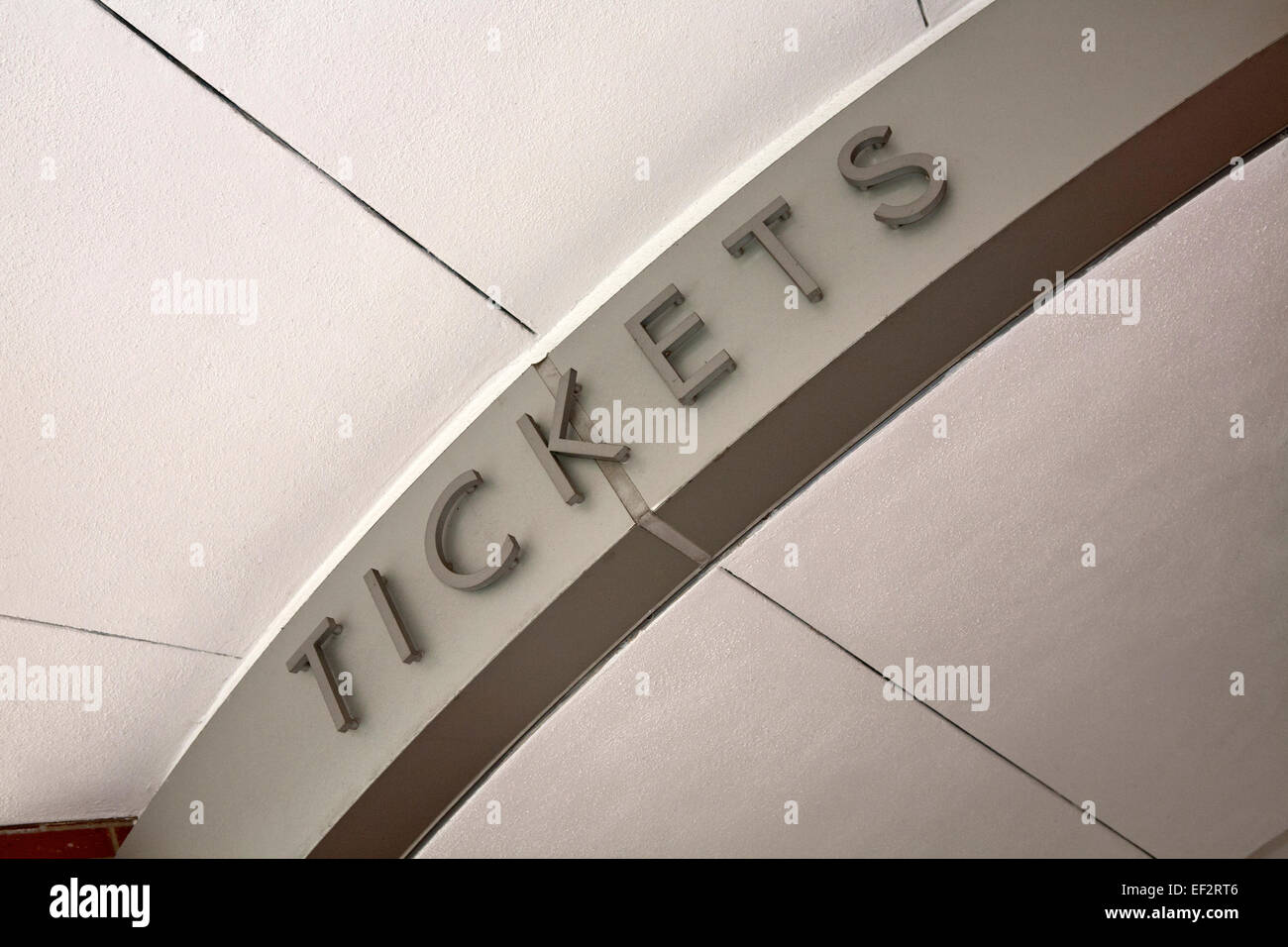 Ticket sign on a building Stock Photo - Alamy