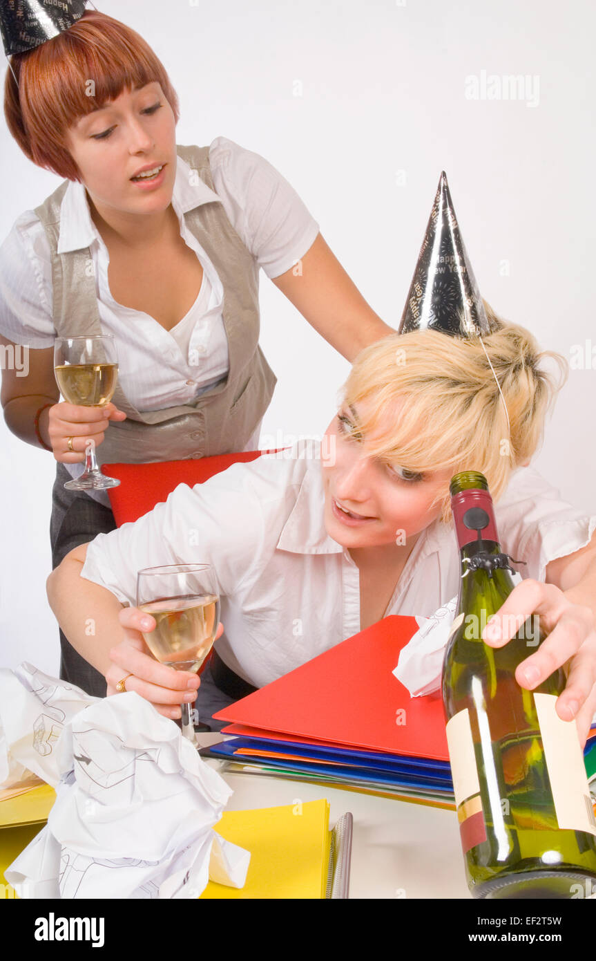 Office workers drinking alcohol hi-res stock photography and images - Alamy