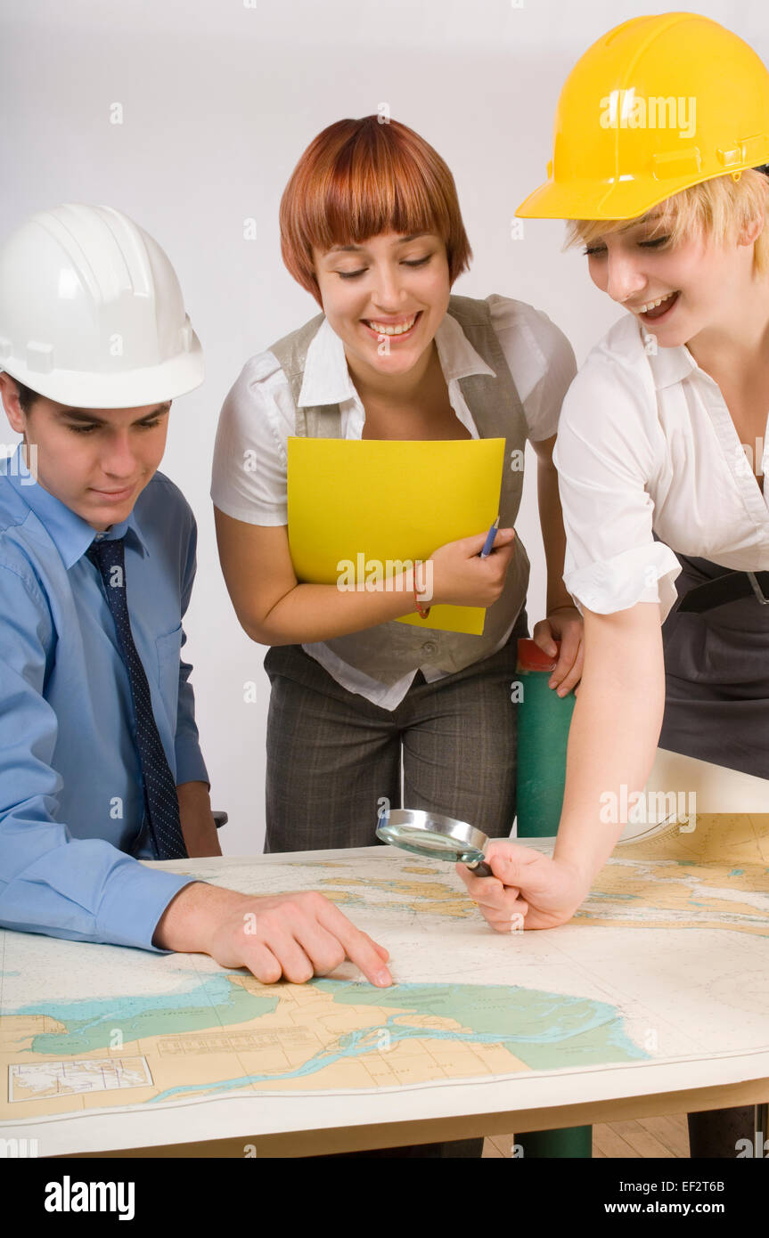 3 young people with map hi-res stock photography and images - Alamy