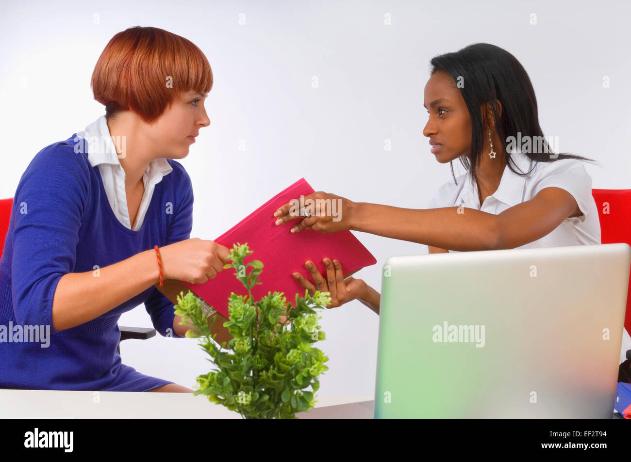 Woman fighting paperwork hi-res stock photography and images - Alamy