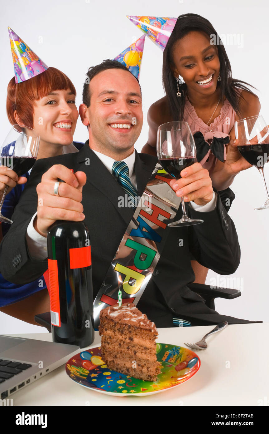 Excited businessman celebrating his birthday with his colleagues Stock ...