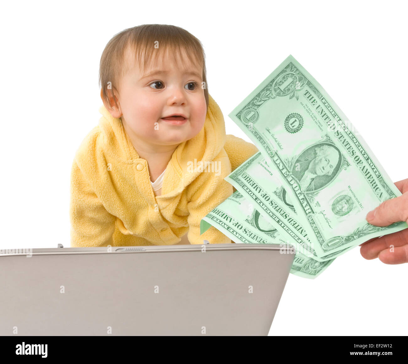 Hand extending money to toddler Stock Photo - Alamy