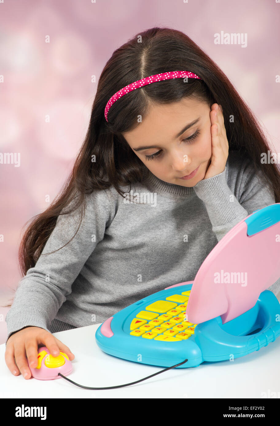 Child learning laptop hi-res stock photography and images - Alamy
