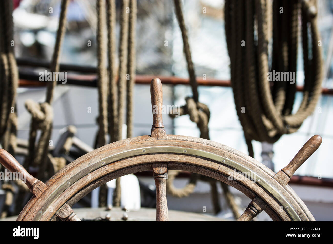 A Ships Wheel or Boats Wheel used to steer a ship Stock Photo - Alamy