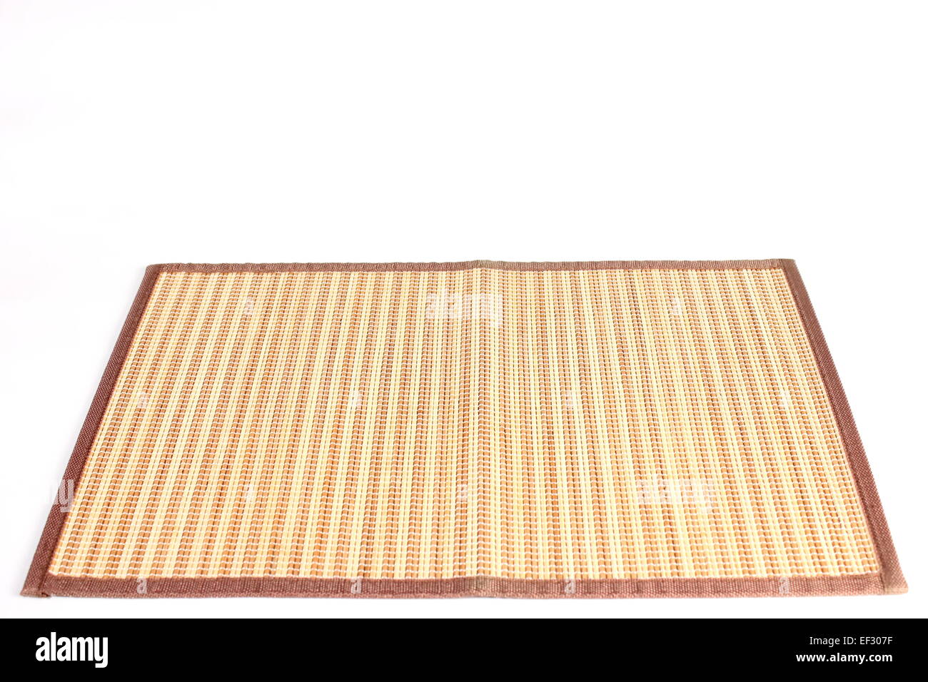Wooden table mat - natural on white background Stock Photo - Alamy