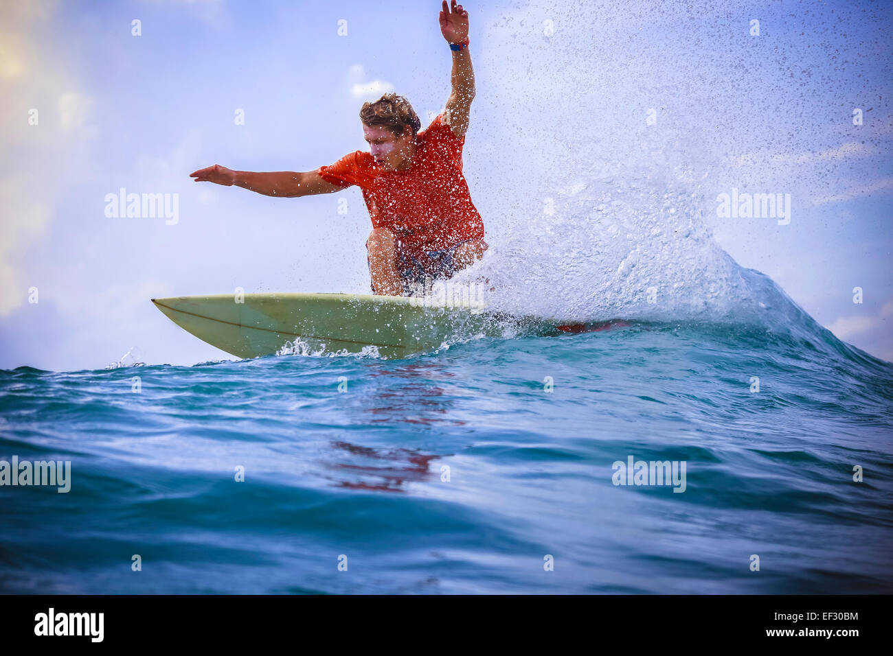 Surfer on Amazing Blue Wave, Bali island Stock Photo - Alamy