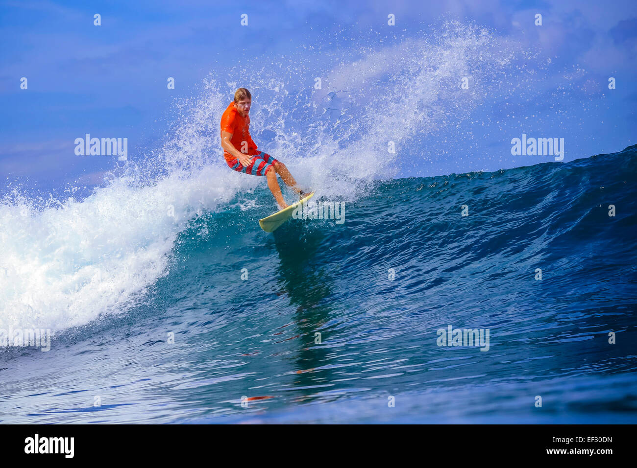 Surfer on Amazing Blue Wave, Bali island Stock Photo - Alamy