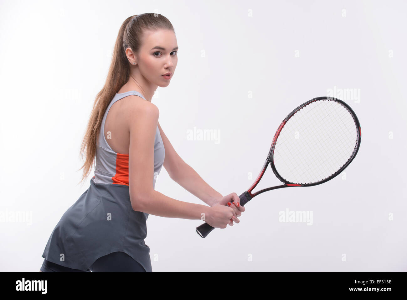 Tennis woman player with racket Stock Photo - Alamy