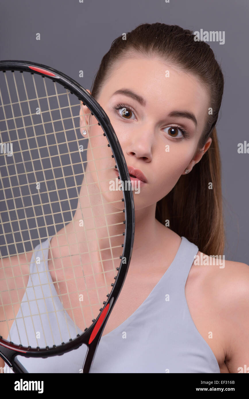Tennis woman player with racket Stock Photo - Alamy