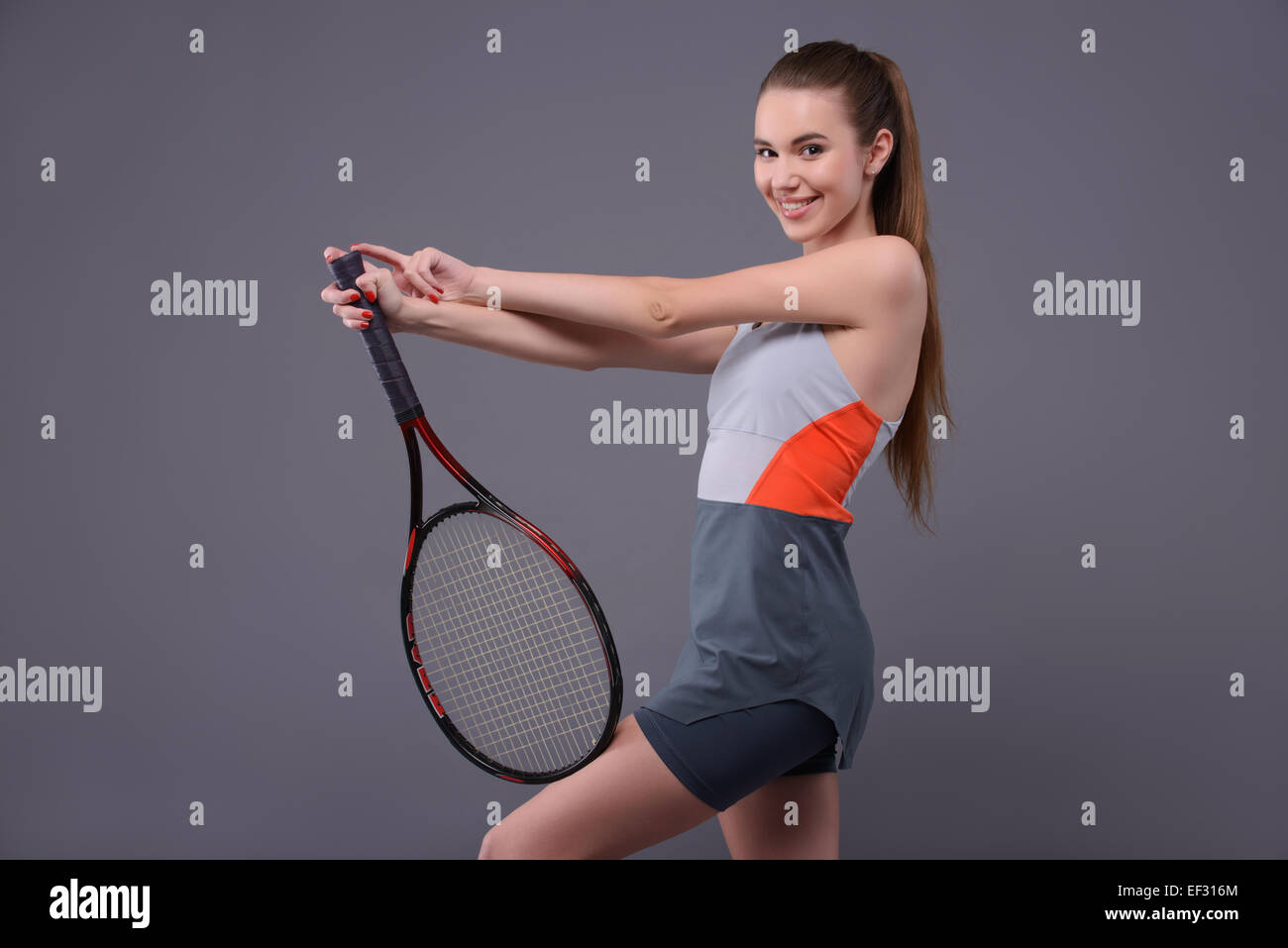 Tennis woman player with racket Stock Photo - Alamy