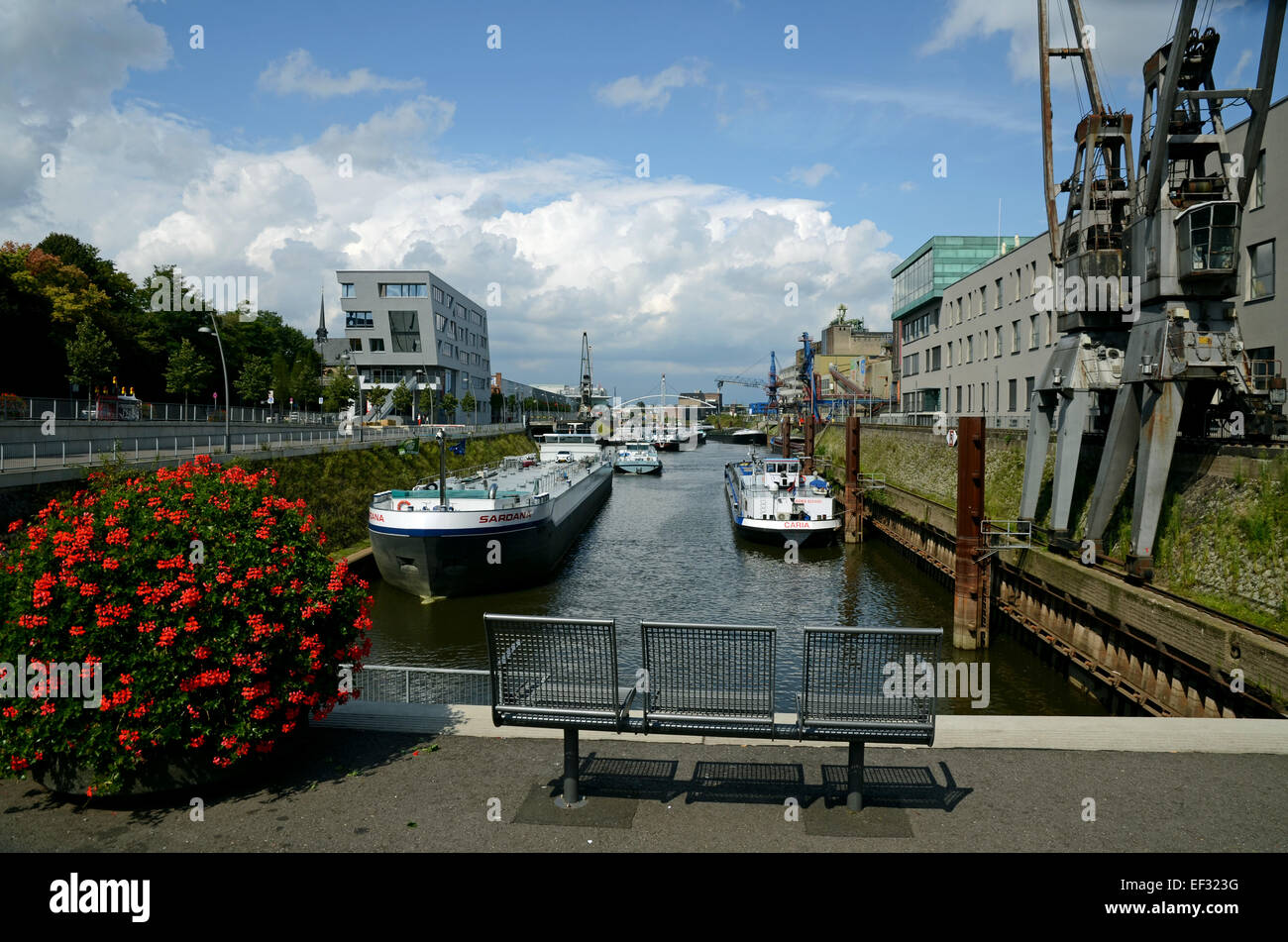 Freighters in the harbor basin I. of the industrial harbor of Neuss ...