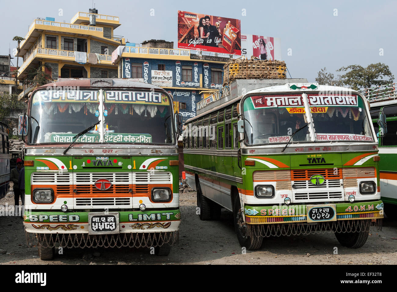Nepalese buses, bus station, building with advertising, Pokhara, Nepal ...