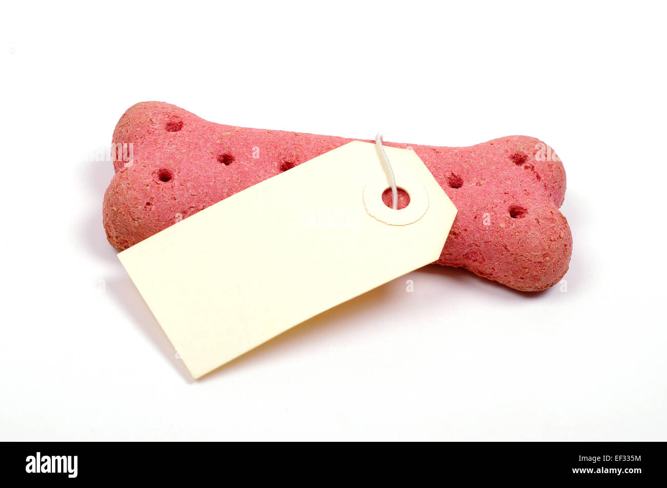 red dog bone and blank label on a white background Stock Photo - Alamy