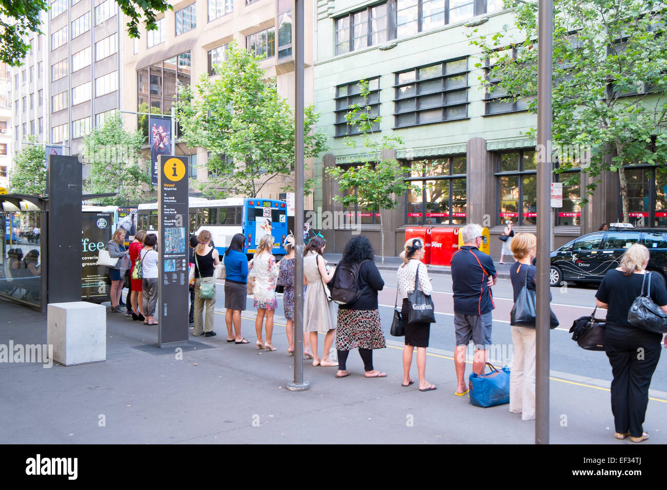 Bus stop queue hi-res stock photography and images - Alamy