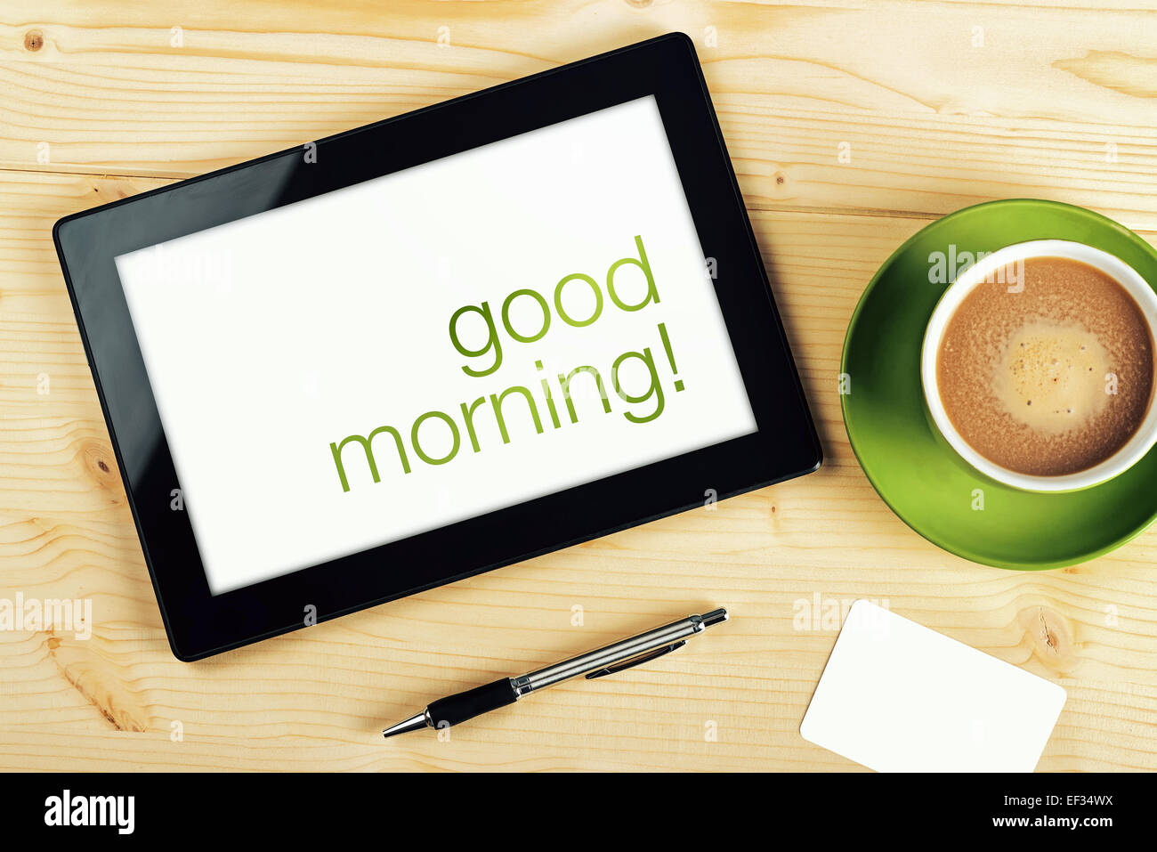 Good Morning Message on Tablet Computer Screen on Office Table Stock ...