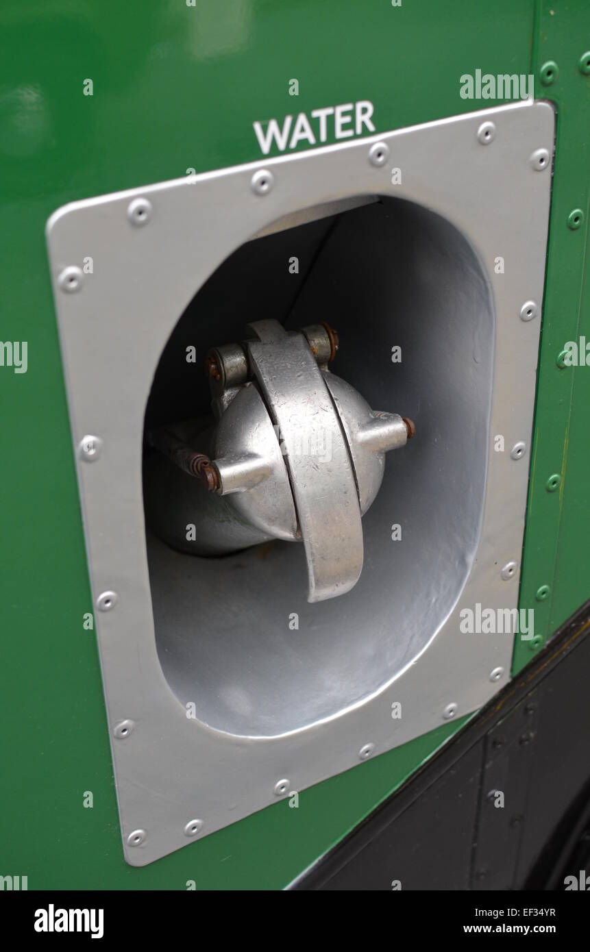 Vintage water filler cap on a British public transport bus from the ...