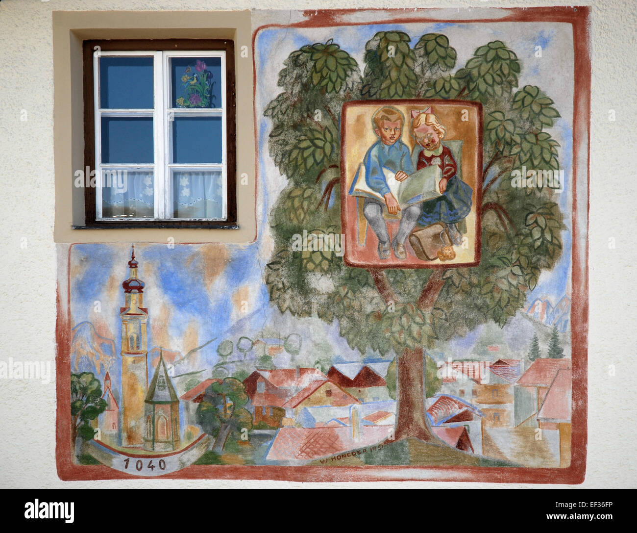 A painted mural on the old primary school building in Baumkirchen ...