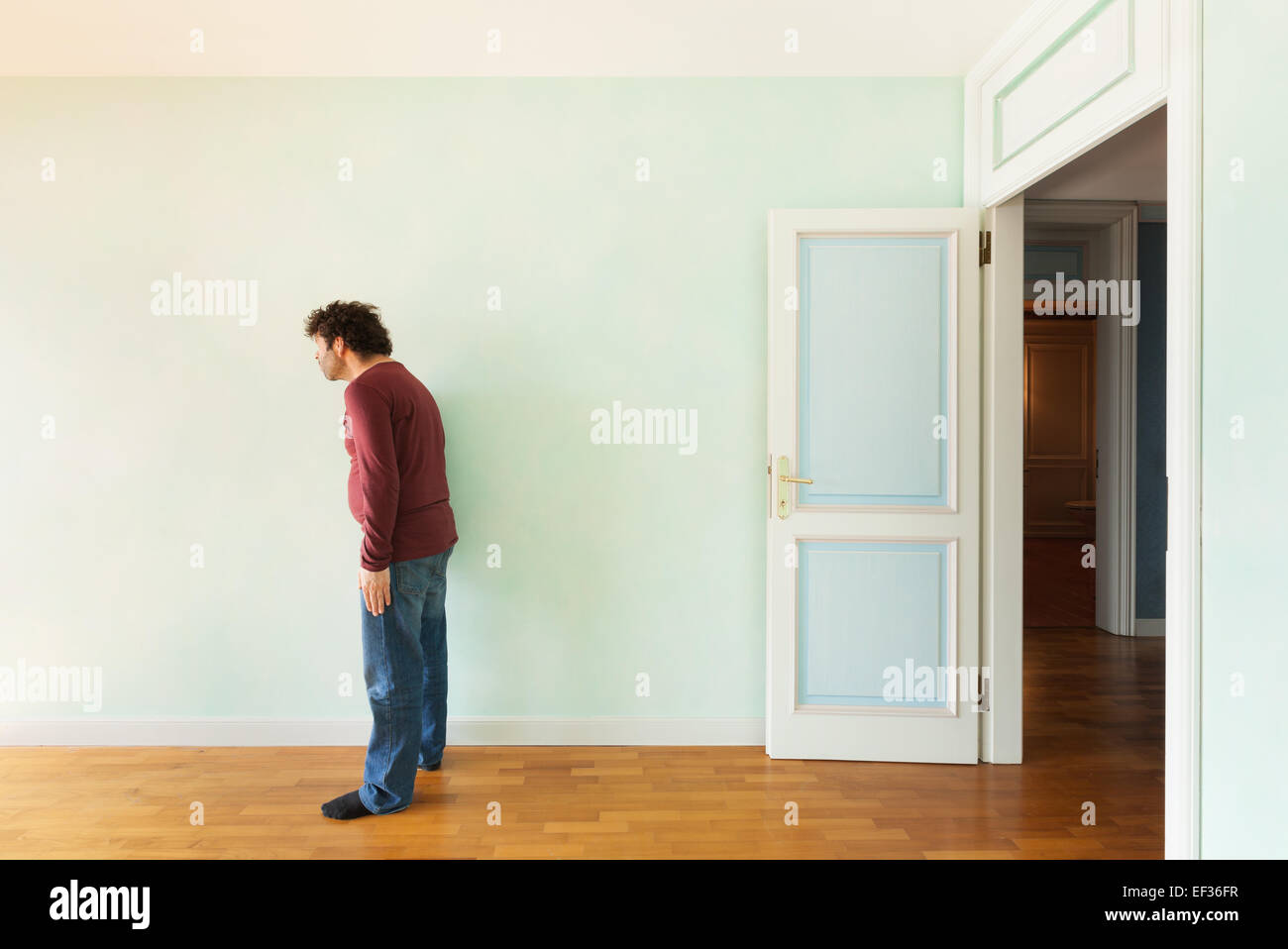 portrait of a weird guy in the room with the door open Stock Photo - Alamy