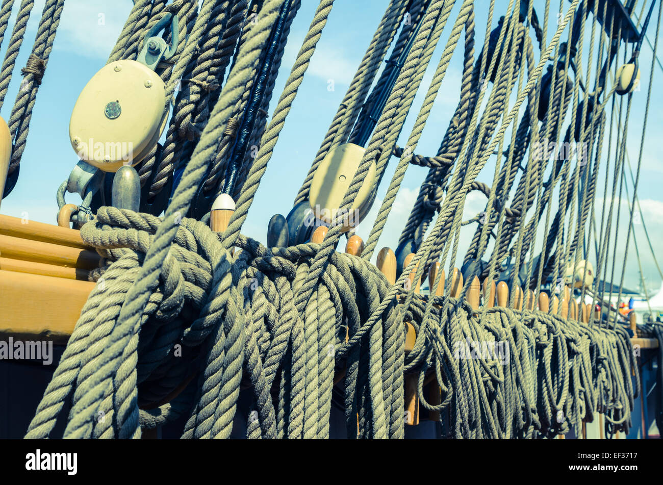 Blocks and tackles of a sailing vessel. Cross process Stock Photo - Alamy