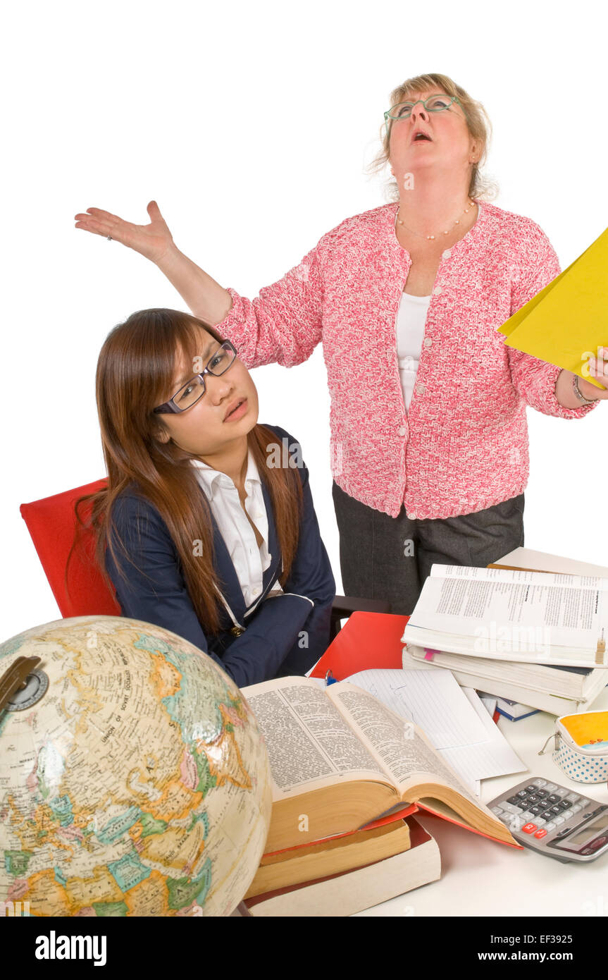 Teacher reprimanding high school student Stock Photo - Alamy