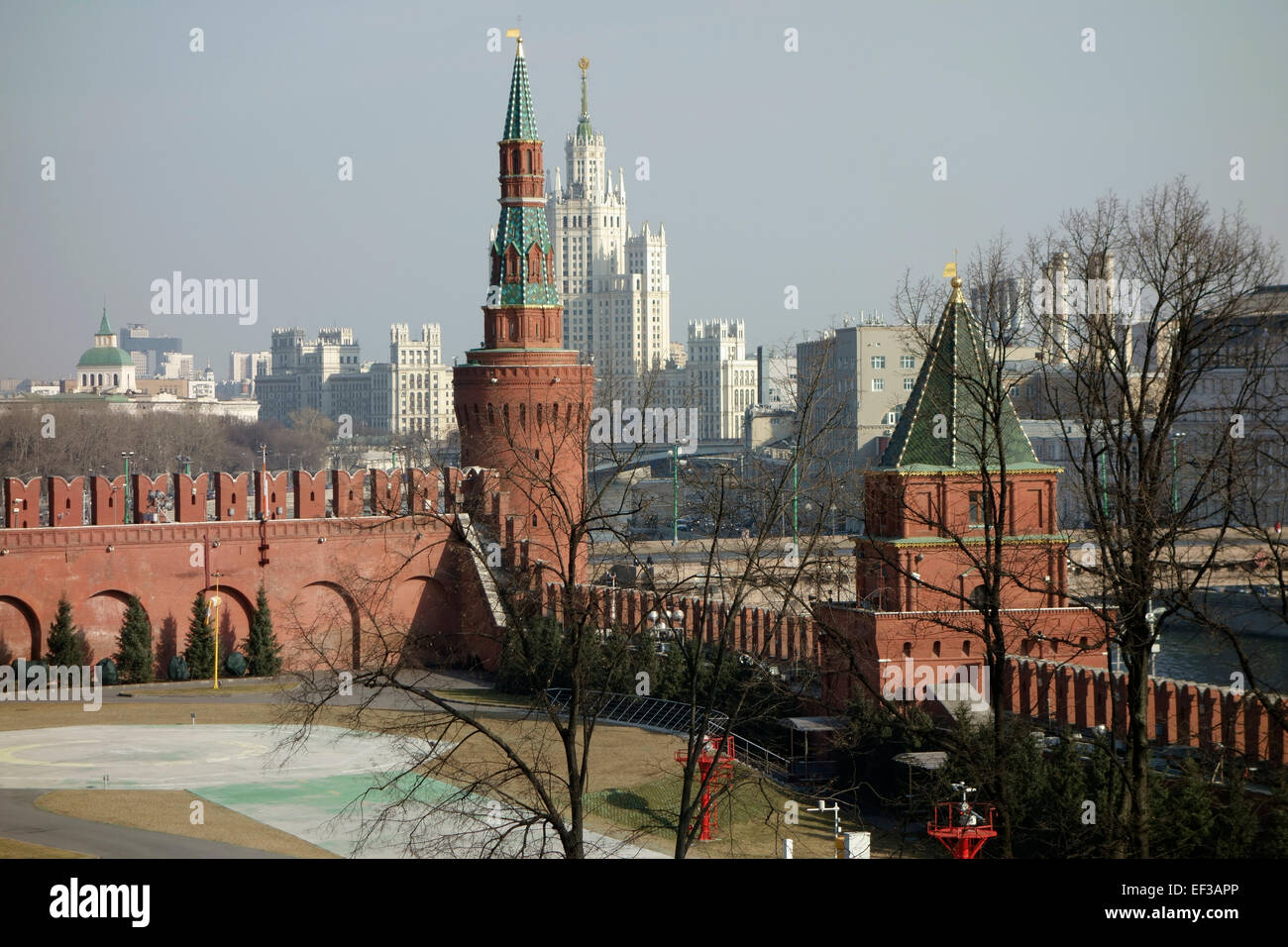 Moscow Kremlin wall and towers and the high-rise building, Moscow ...