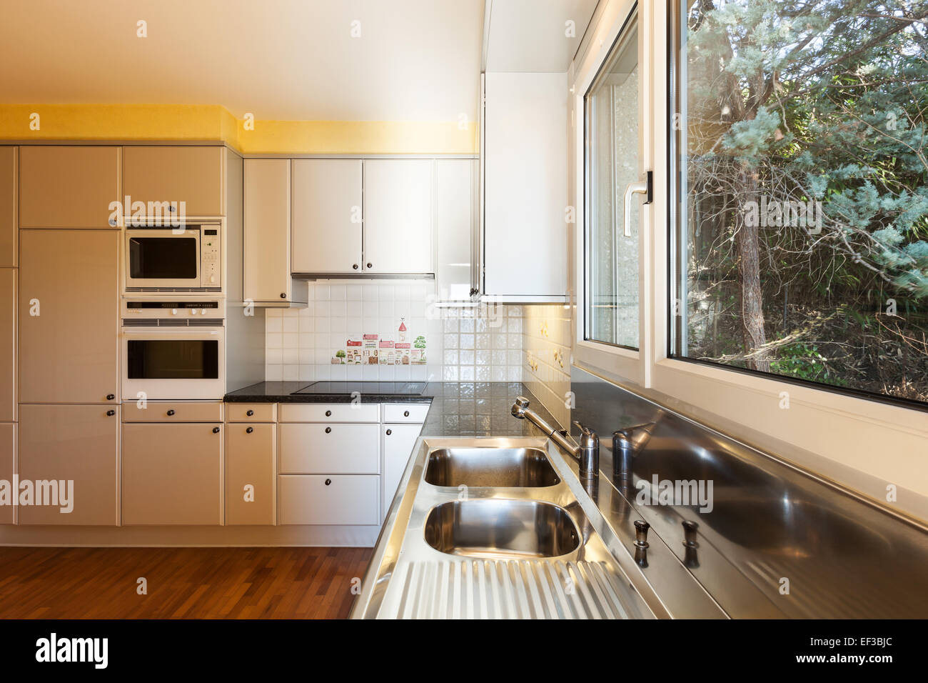 Interior apartment, kitchen with window Stock Photo - Alamy