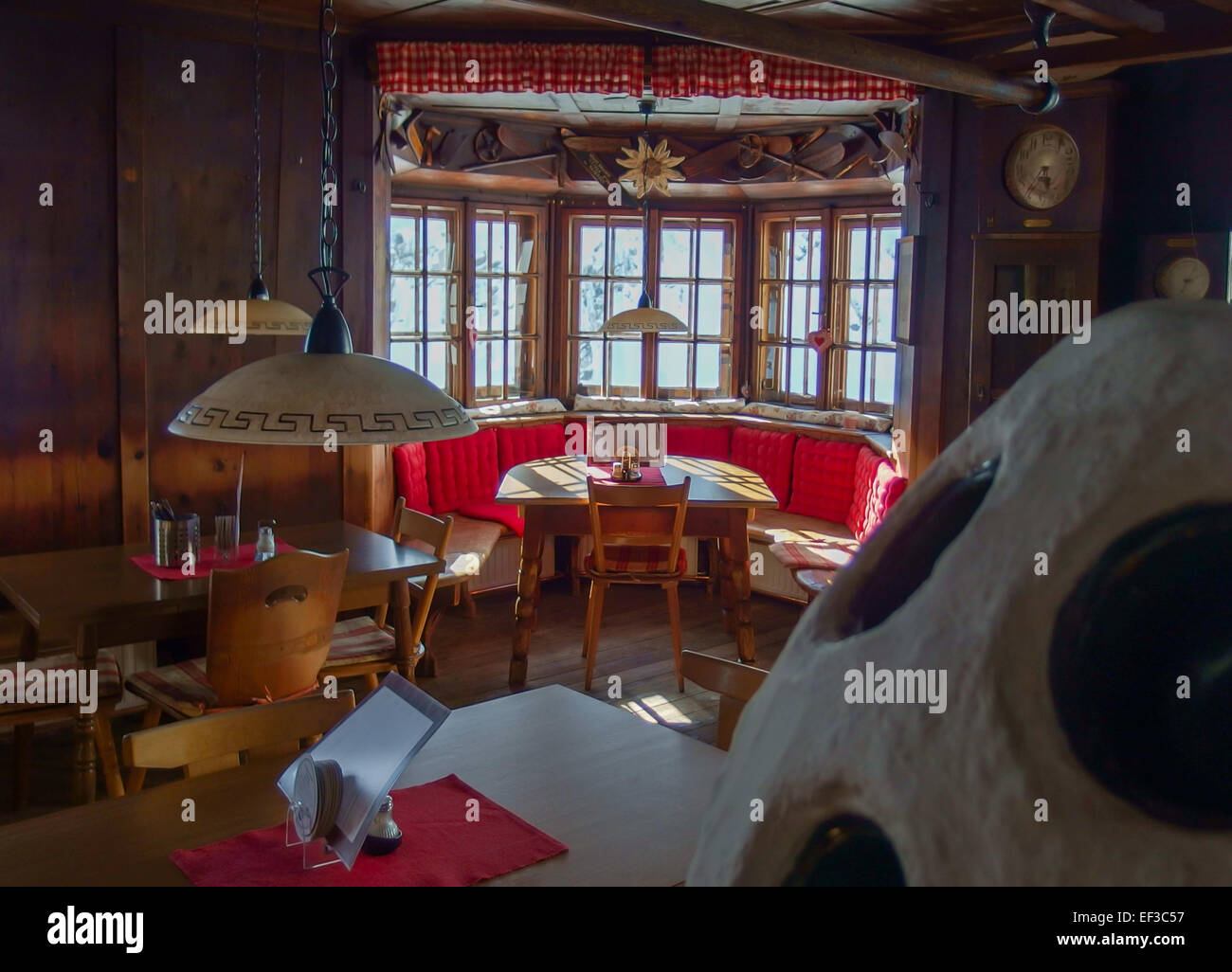 This image of the Potsdamer Hütte interior showcases the classic alpine ...