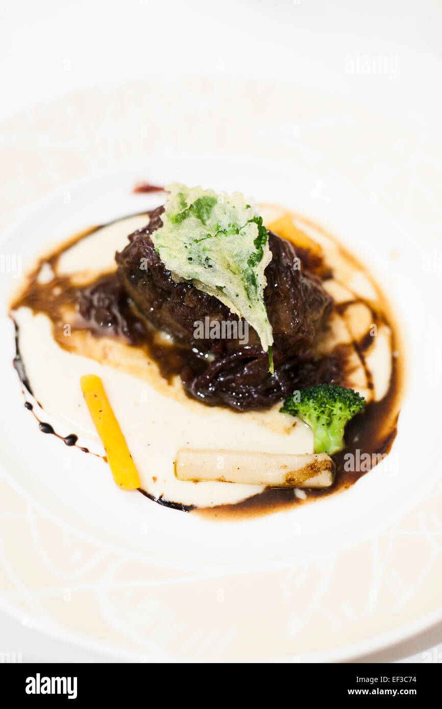 Ox cheek braised with wine Stock Photo - Alamy