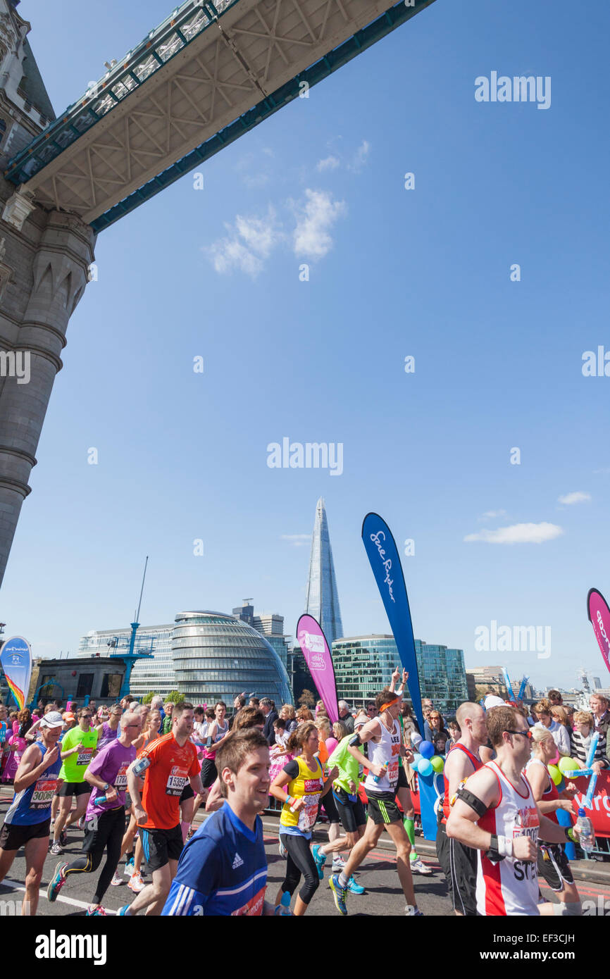England, London, London Marathon, Runners on Tower Bridge Stock Photo ...