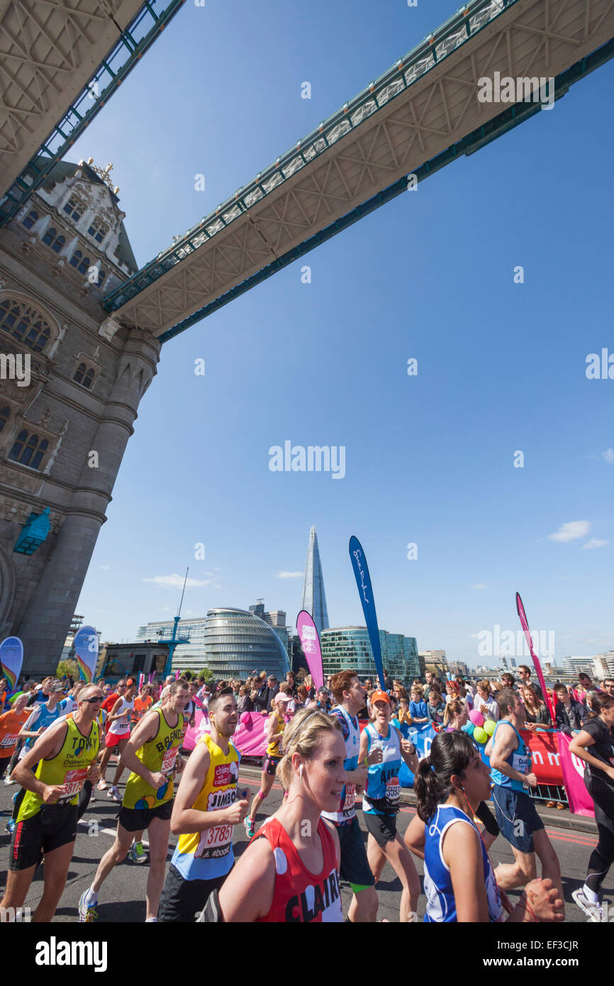 England, London, London Marathon, Runners on Tower Bridge Stock Photo ...