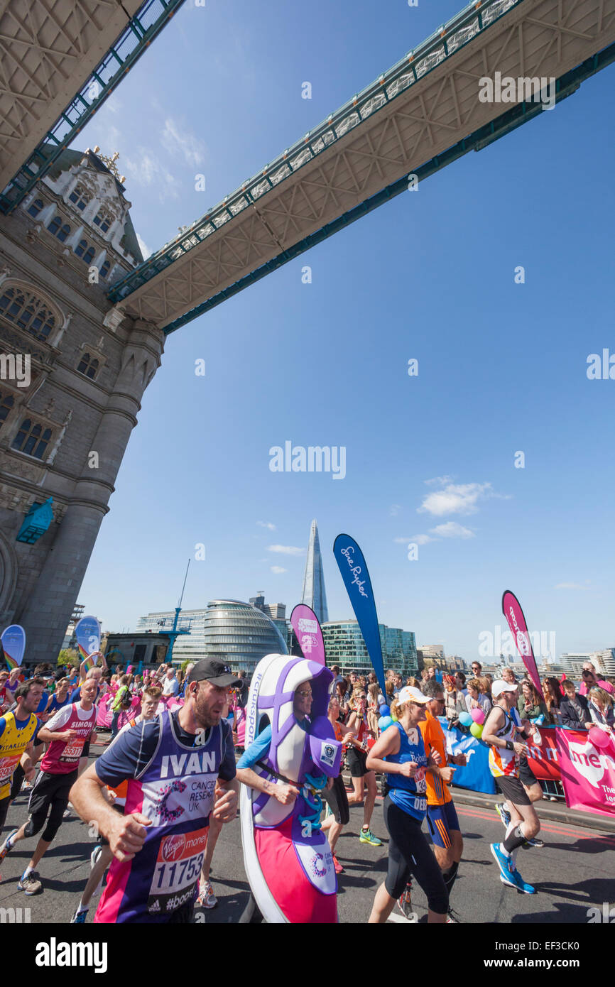 England, London, London Marathon, Runners on Tower Bridge Stock Photo ...