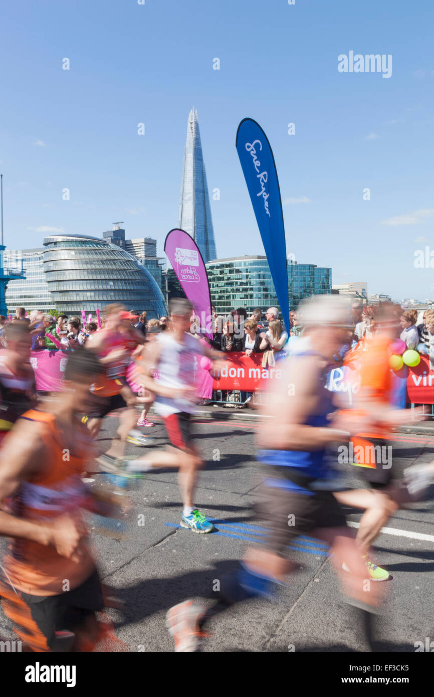 England, London, London Marathon, Runners on Tower Bridge Stock Photo ...