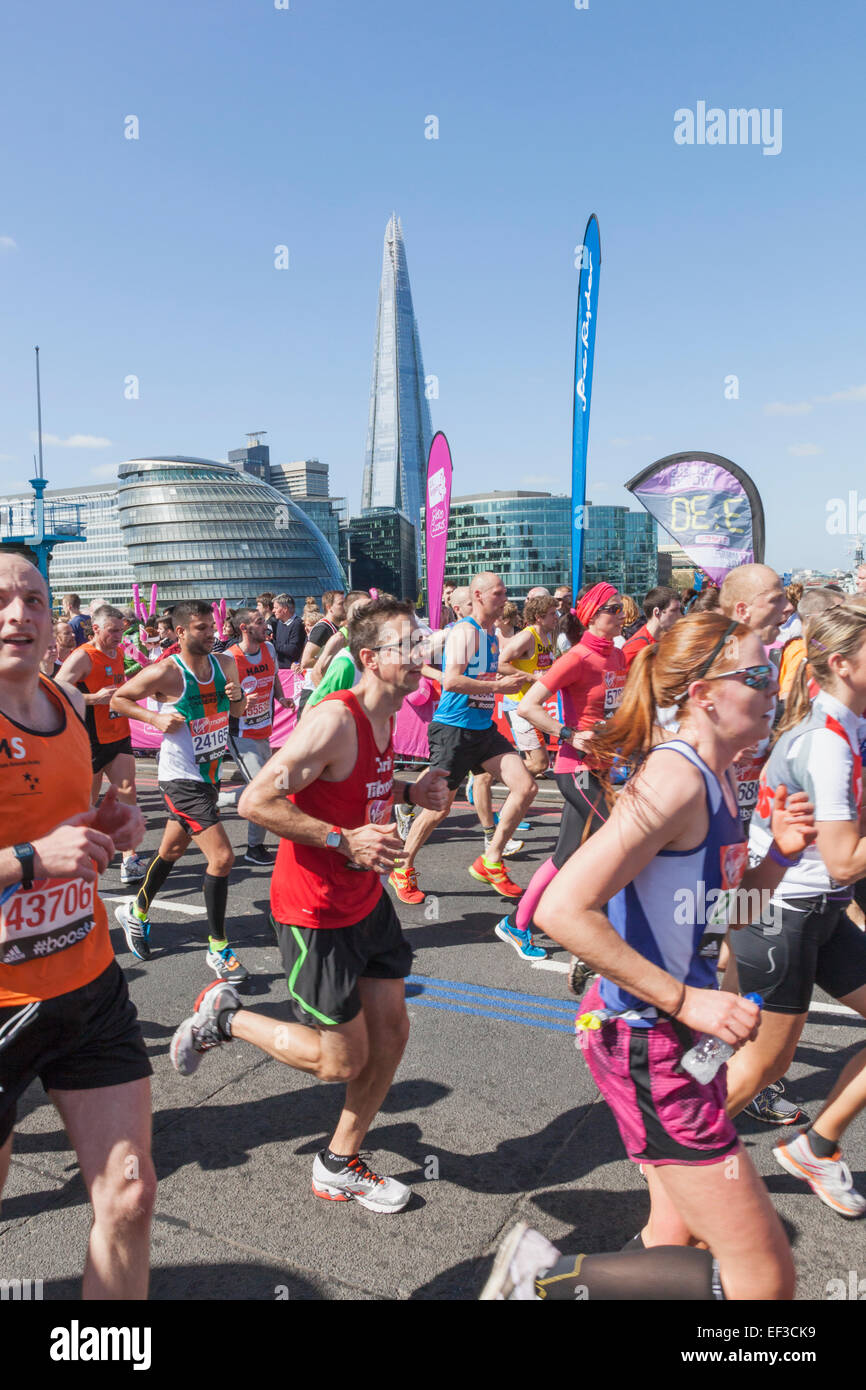 England, London, London Marathon, Runners on Tower Bridge Stock Photo ...