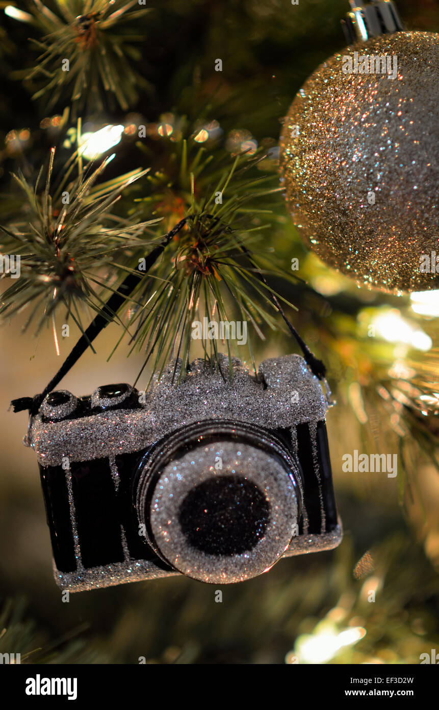 Camera Ornament Hanging on Christmas Tree Stock Photo - Alamy