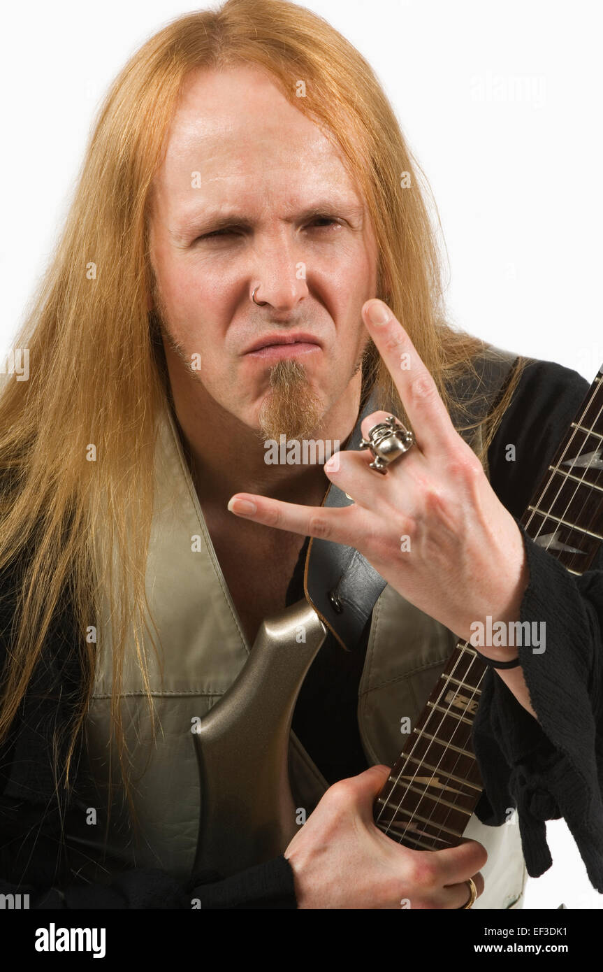 Guitarist giving peace sign Stock Photo - Alamy
