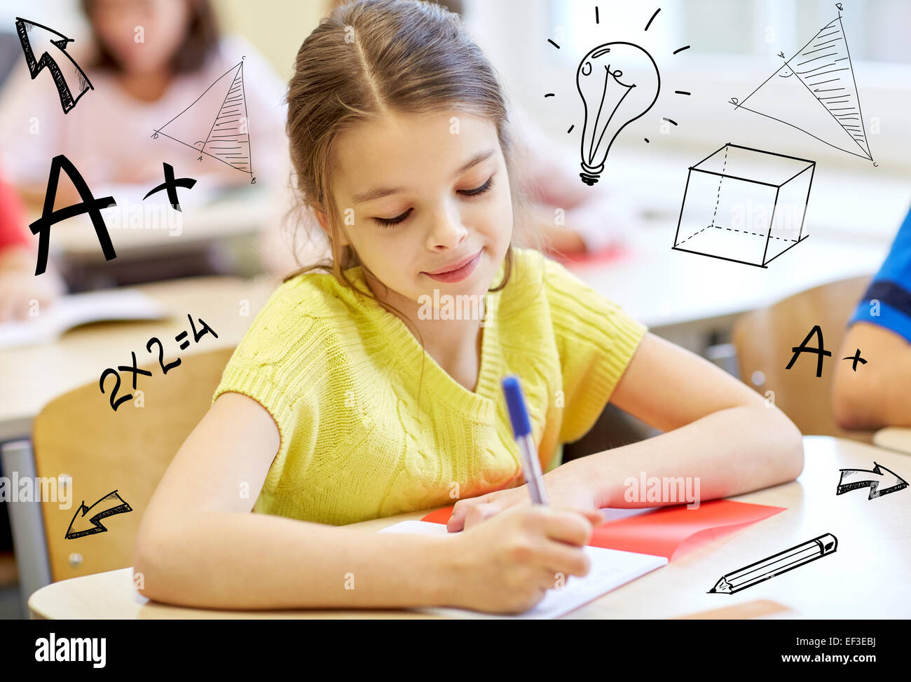 group of school kids writing test in classroom Stock Photo - Alamy