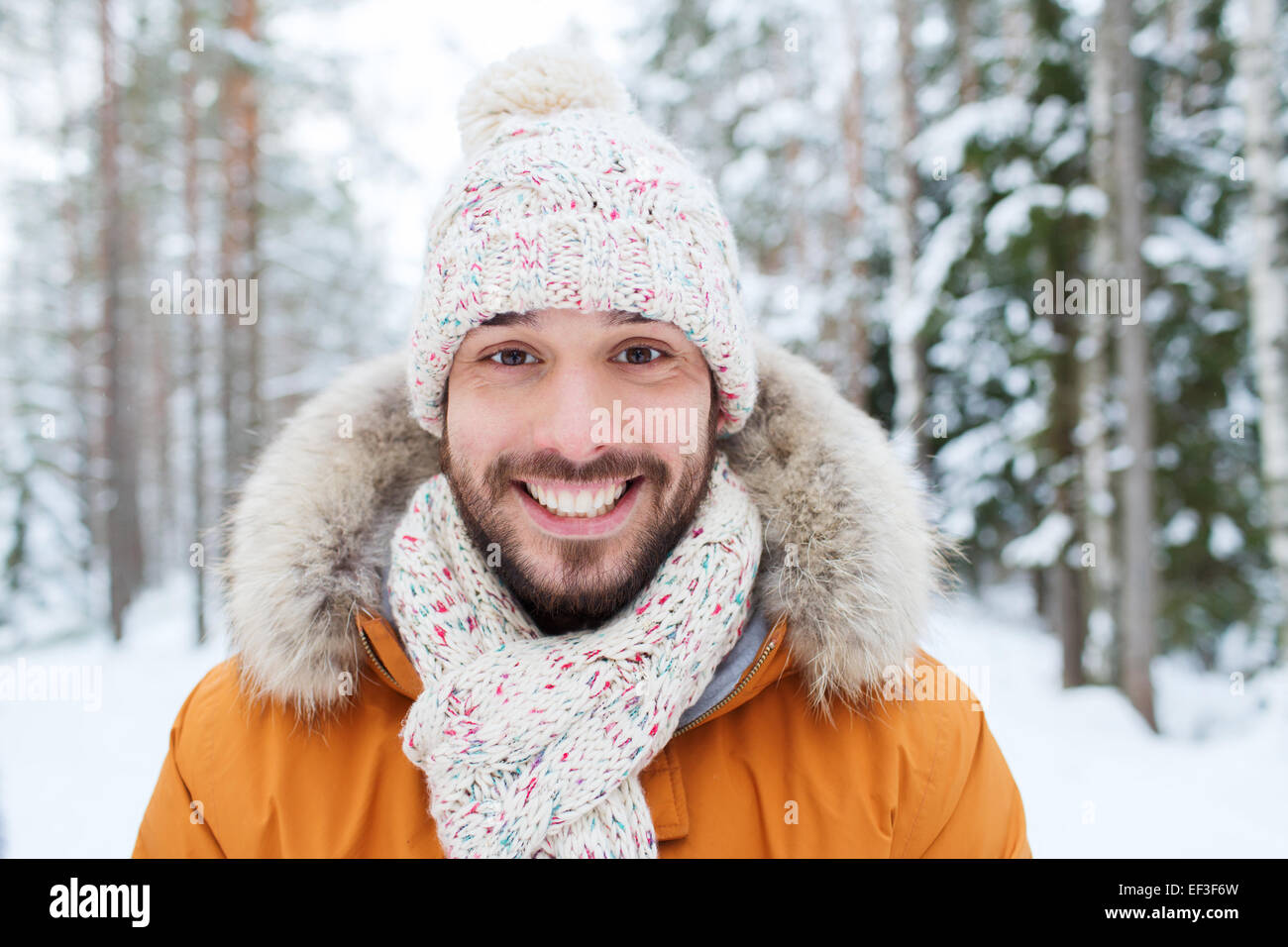 Man in snowy winter forest hi-res stock photography and images - Alamy