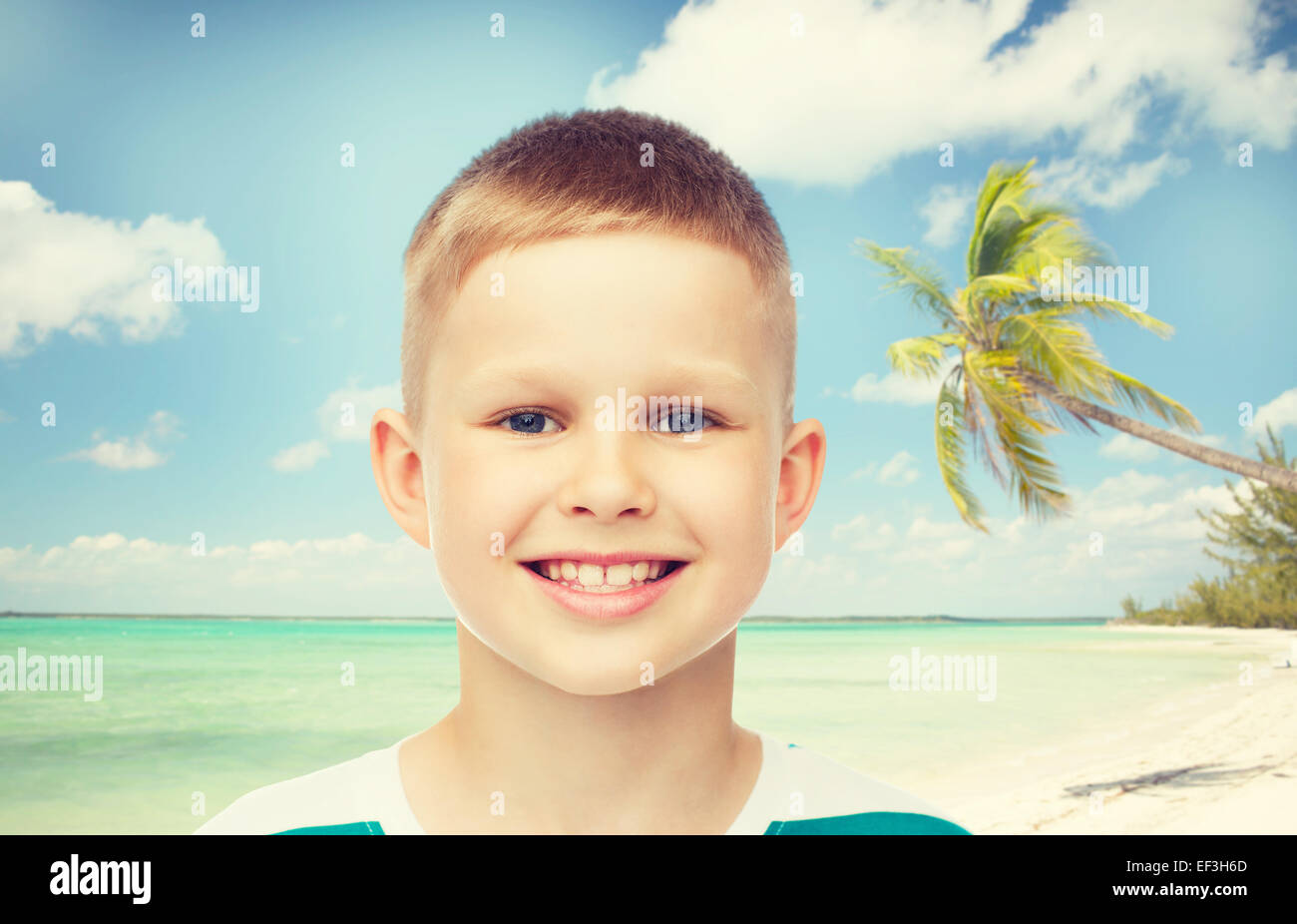 smiling little boy over green background Stock Photo - Alamy