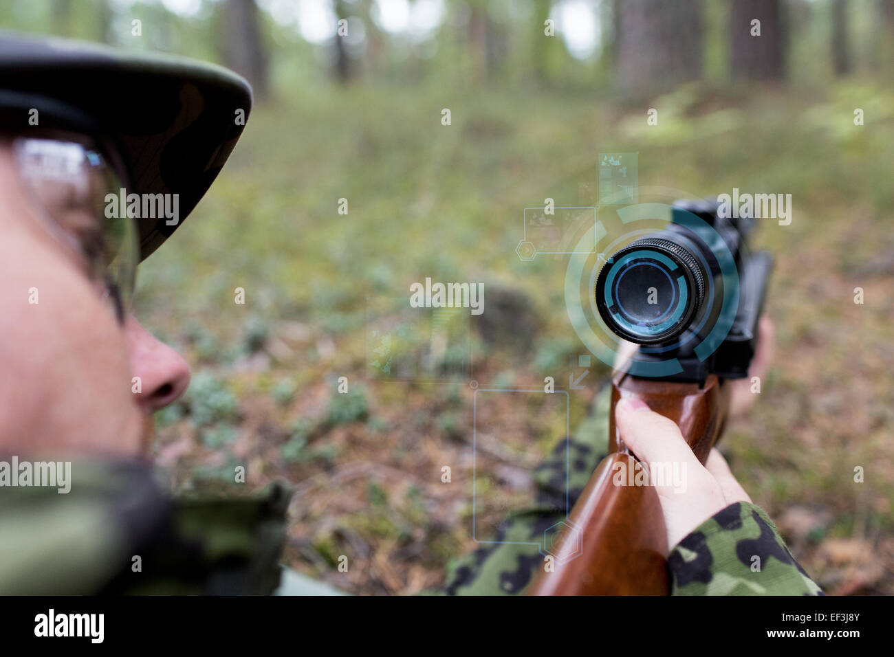 close up of soldier or sniper with gun in forest Stock Photo - Alamy