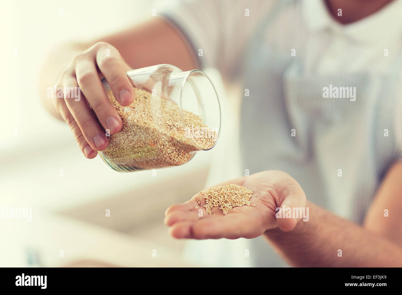 Man emptying jar hi-res stock photography and images - Alamy