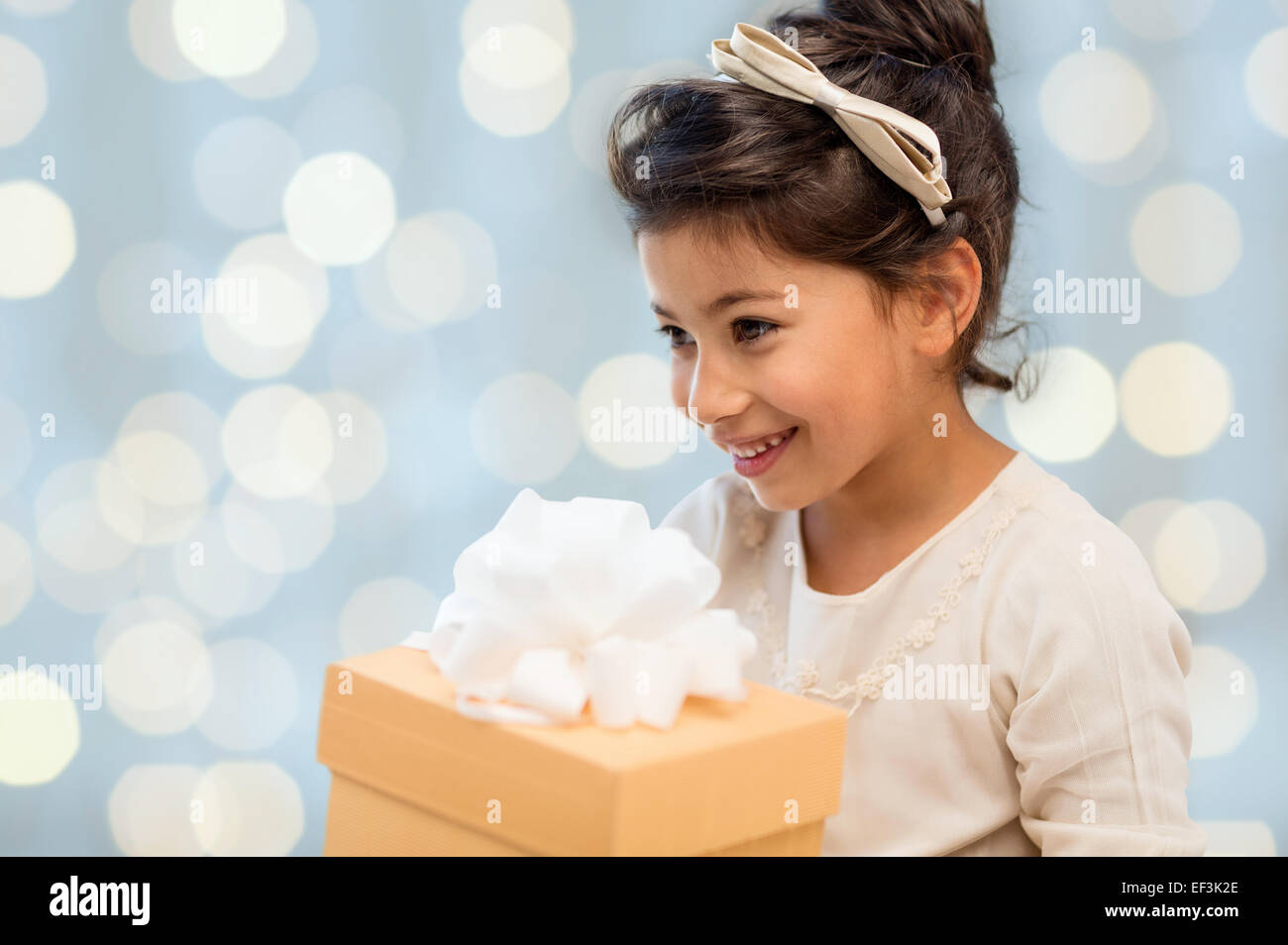 happy little girl with gift box Stock Photo - Alamy