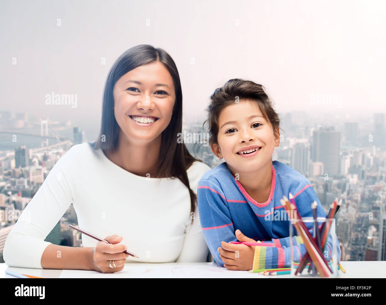 Hispanic mom daughter homework hi-res stock photography and images - Alamy